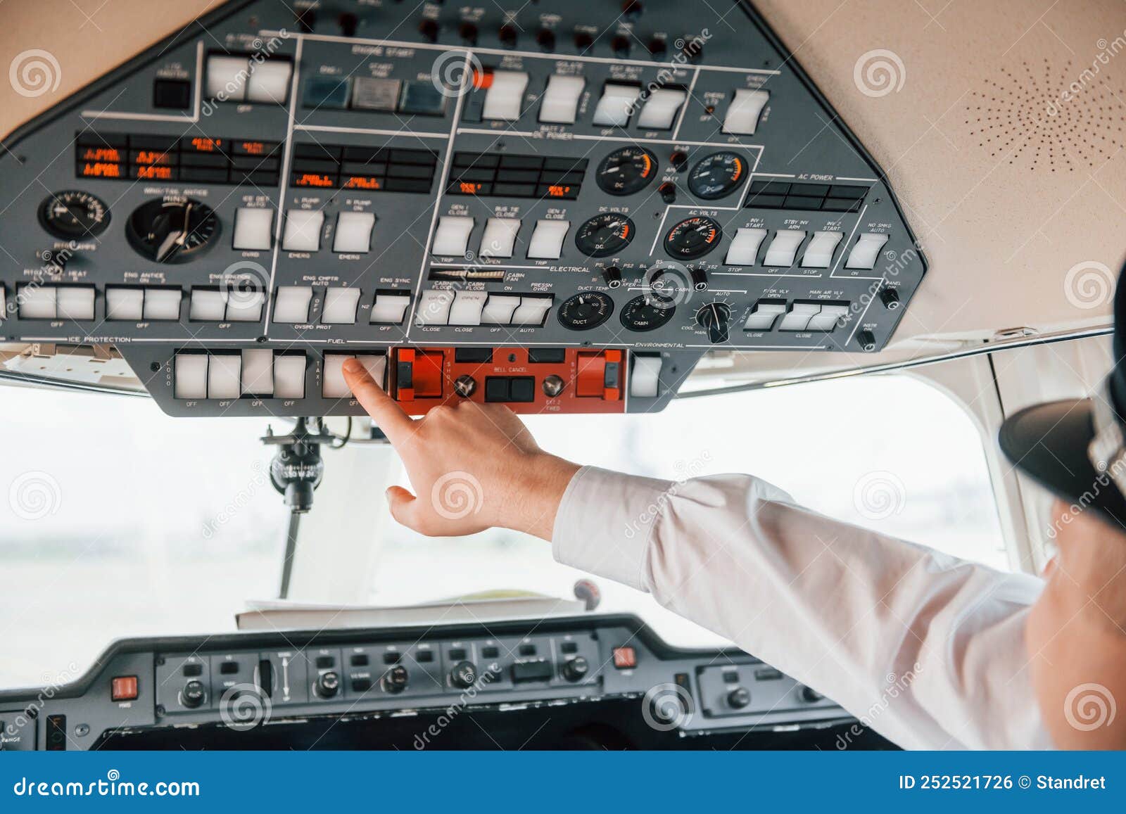 Close Up View. Pilot on the Work in the Passenger Airplane Stock Photo ...