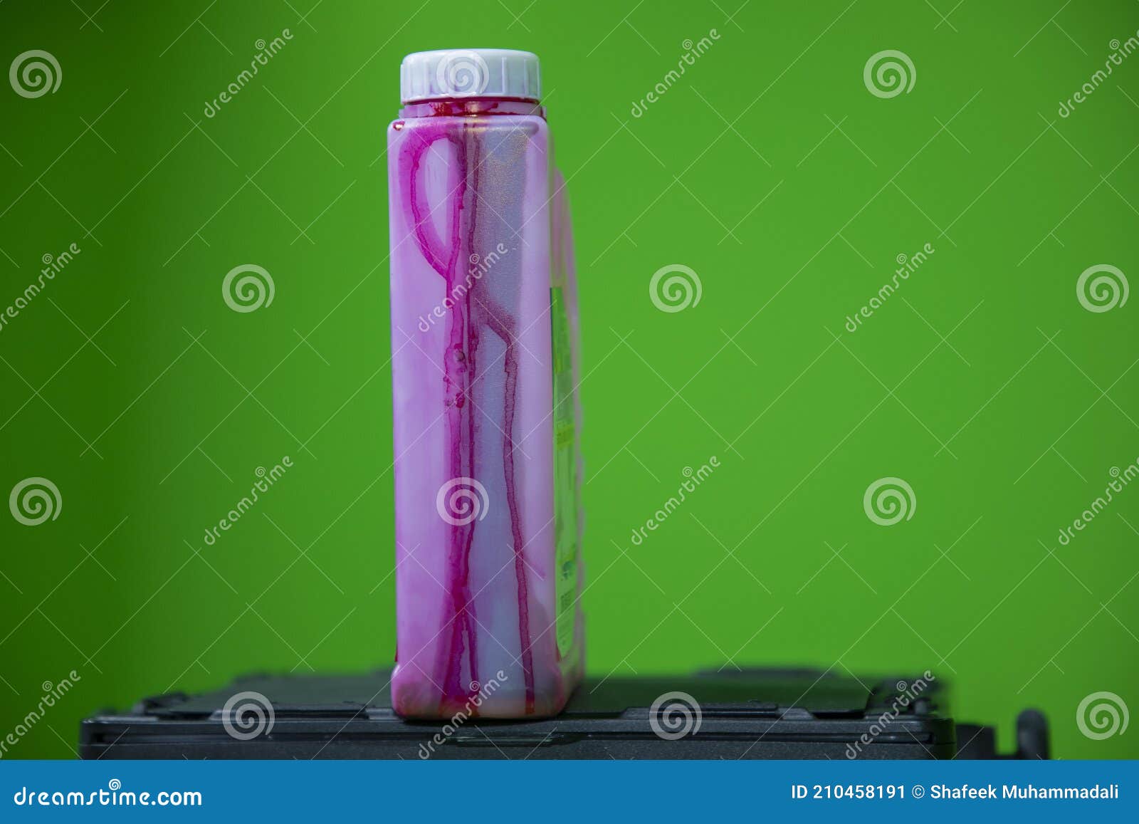 Close Up View of Red Colored Ink Bottle Which is Used in Color Printer ...