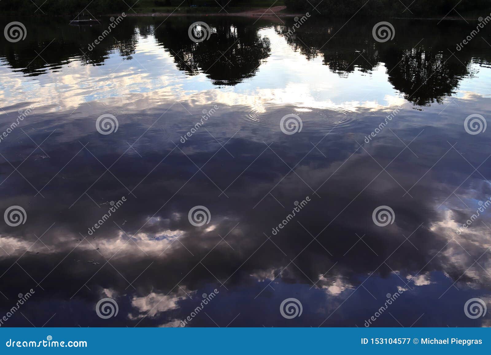 Close Up View on a Reflective Water Surface with Waves and Ripples in ...