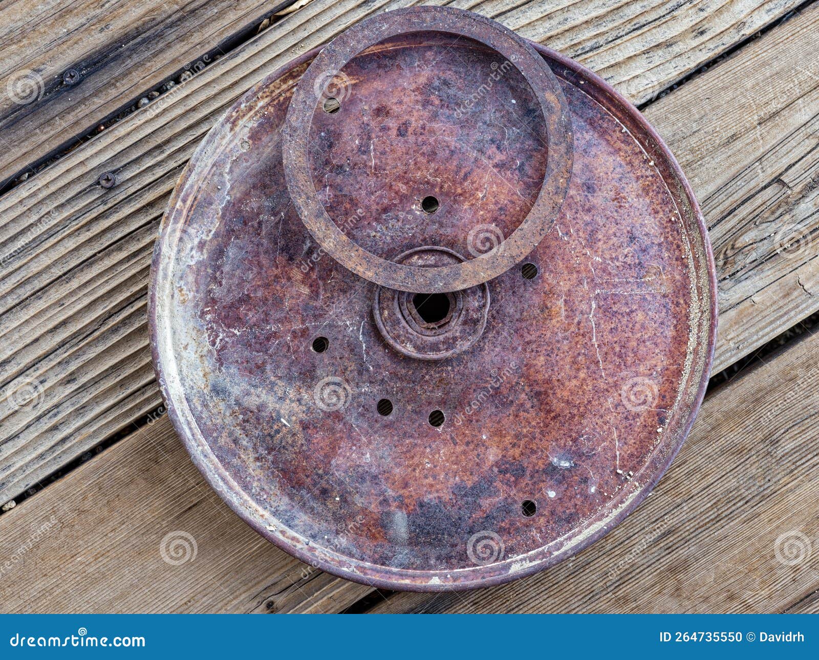 Close Up View of a Rusty Disc with a Metal Ring on Top Stock Photo ...
