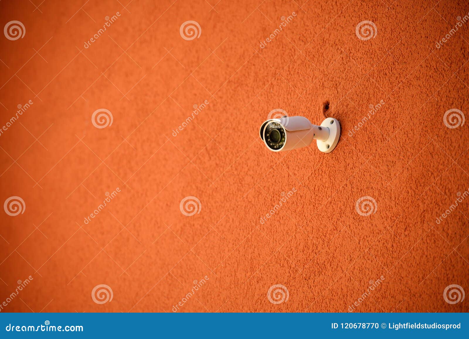 Close Up View of Security Camera on Orange Colored Stock Photo - Image ...