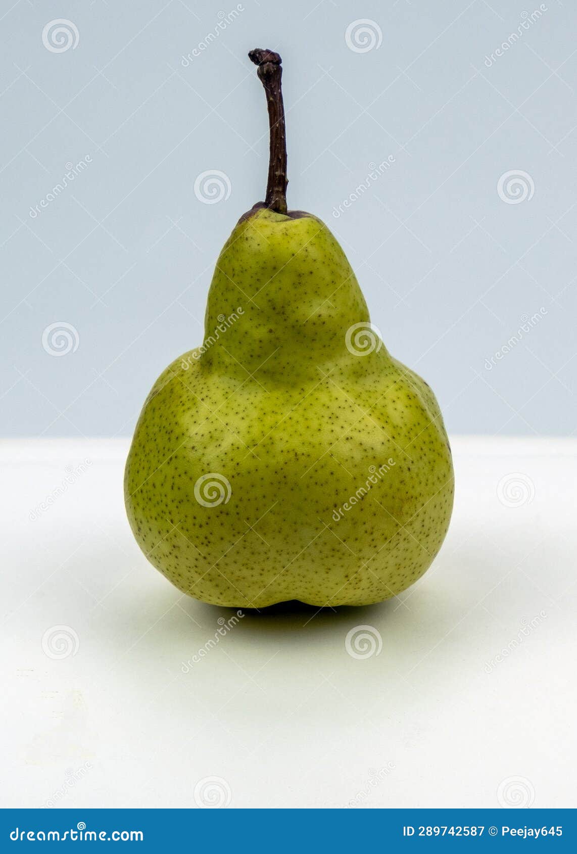 View of a Single Pear 0n a Plain Background Stock Image - Image of ...