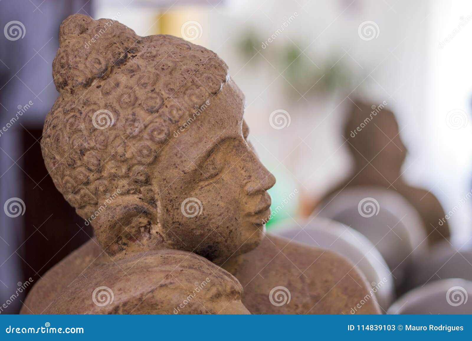 Small brown Buddha statue stock image. Image of peace - 114839103