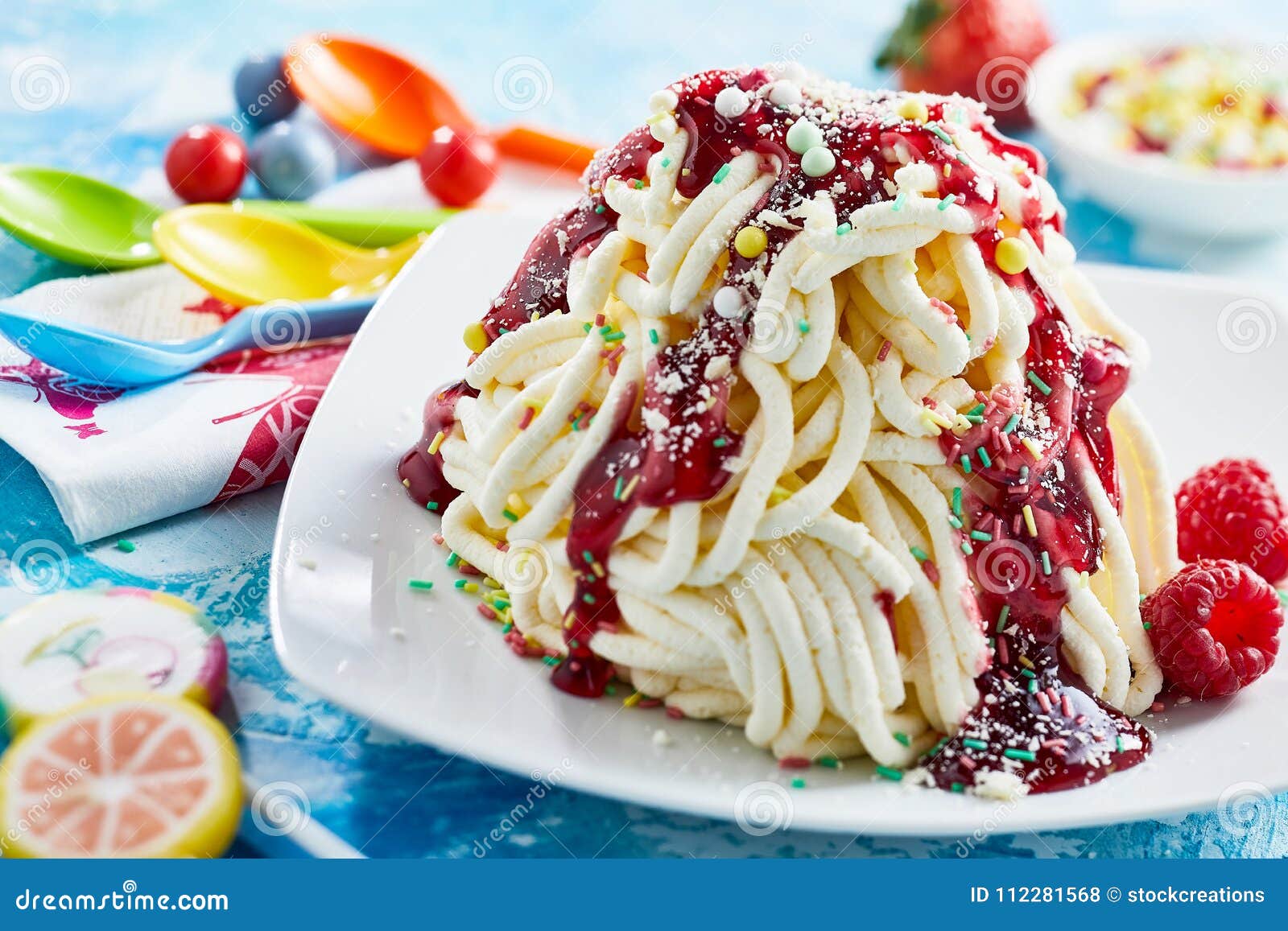 Spaghetti Ice Cream Dessert with Raspberry Topping Stock Photo - Image ...