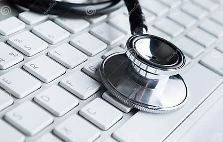 Close Up View of Stethoscope on Computer Keyboard Stock Photo - Image ...