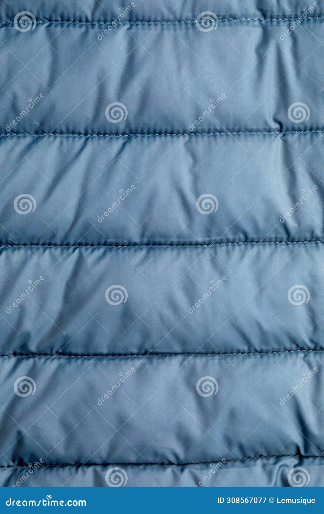 Close-up View of the Texture of Blue Soft Puffer Down Jacket Fabric ...