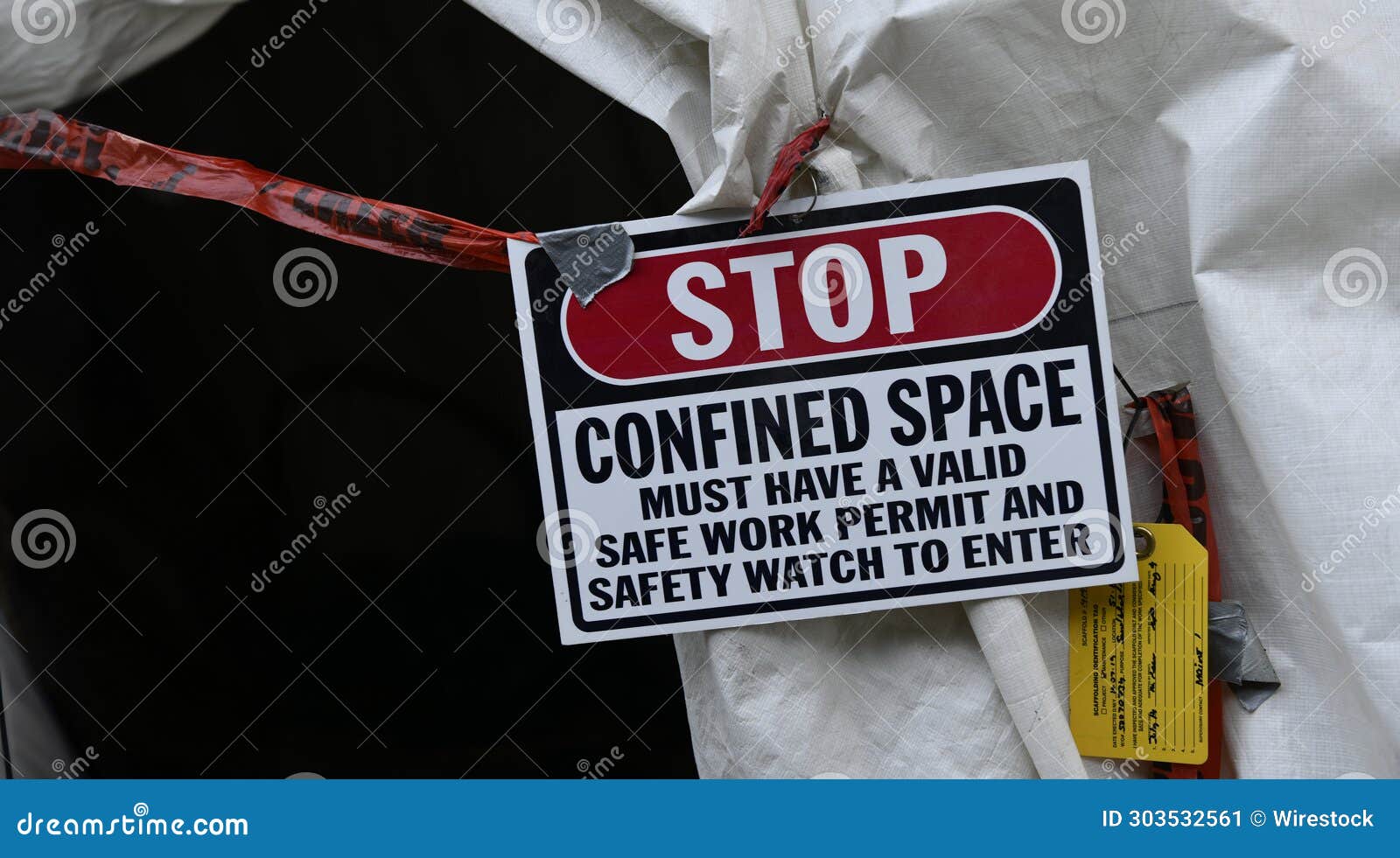 Close-up View of a Warning Sign for Workplace Safety in a Confined ...