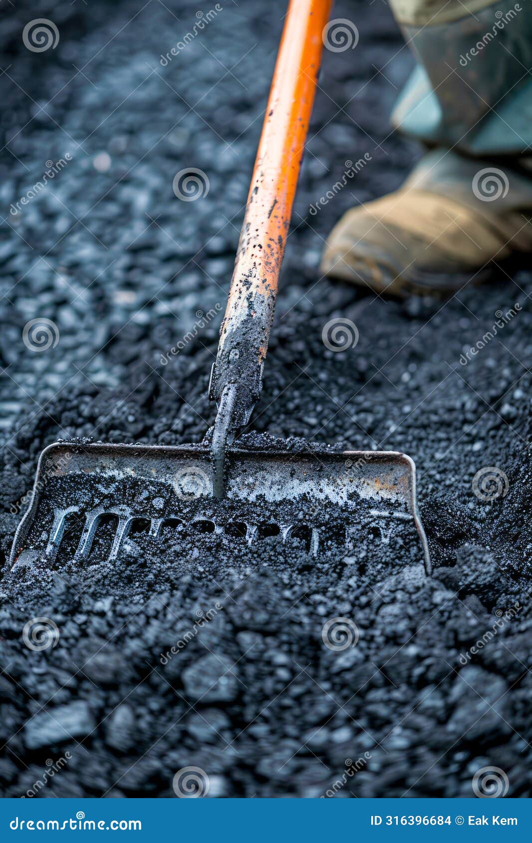 Close Up View of Worker Leveling Asphalt with Rake during Road ...