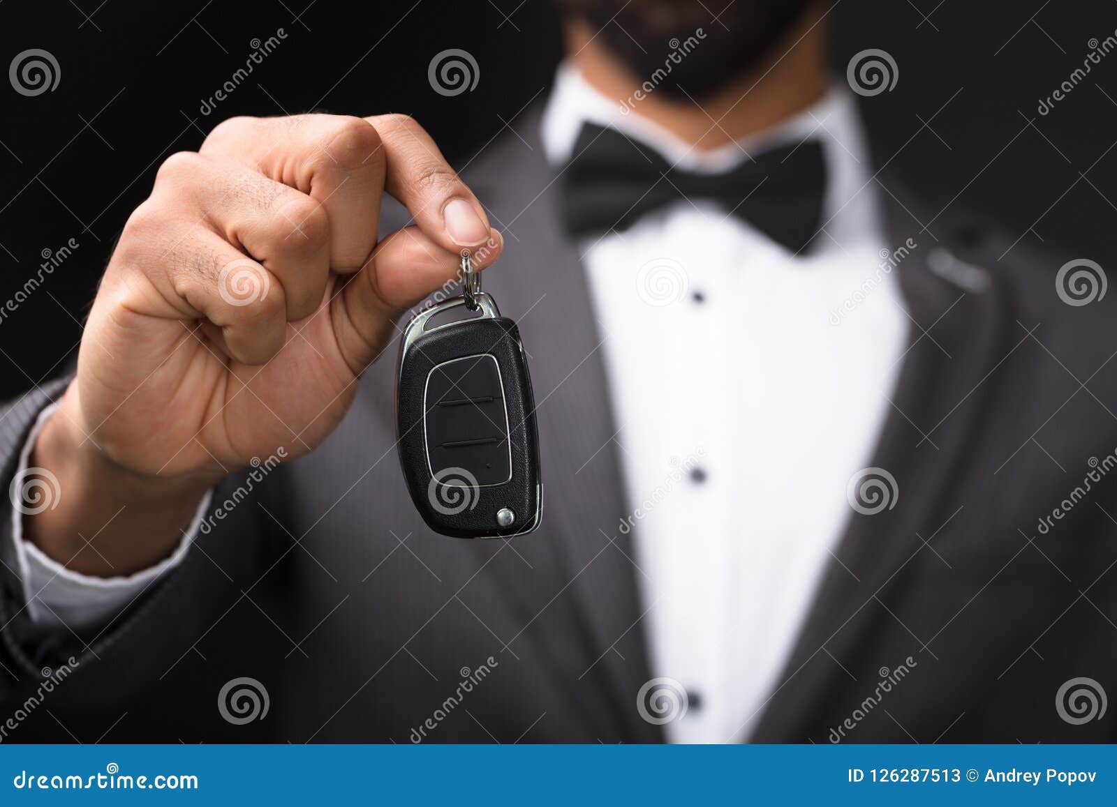 Waiter Holding Car Key stock image. Image of employee - 126287513