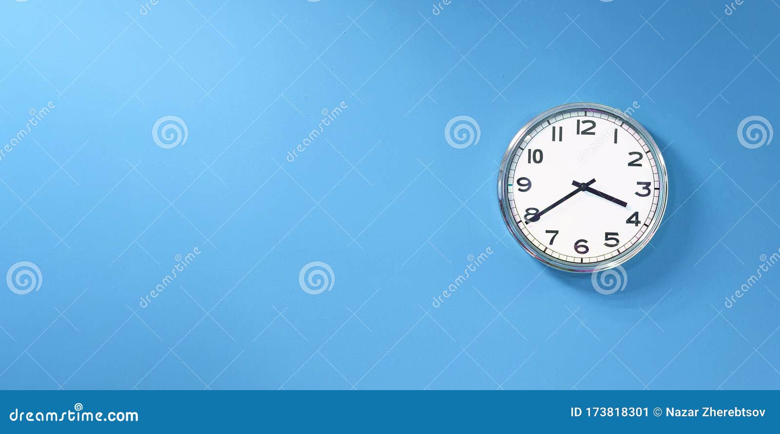 Close-up Wall Clock Set on Blue Background. the Concept of the Time is ...