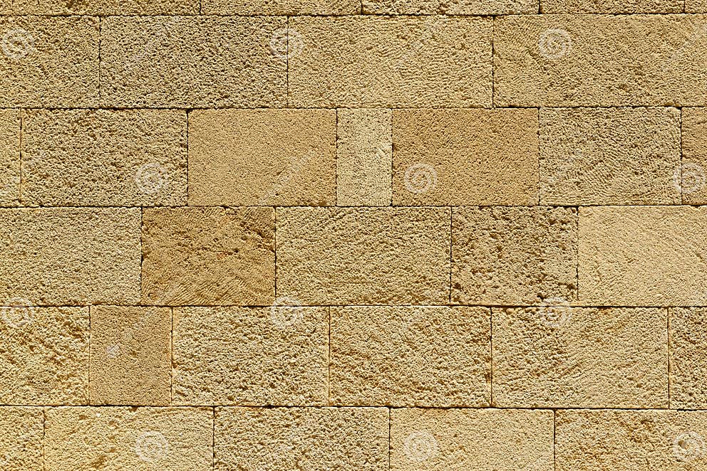 Close Up of a Wall Made of Rectangular, Tan Stone Blocks. Mediterranean ...