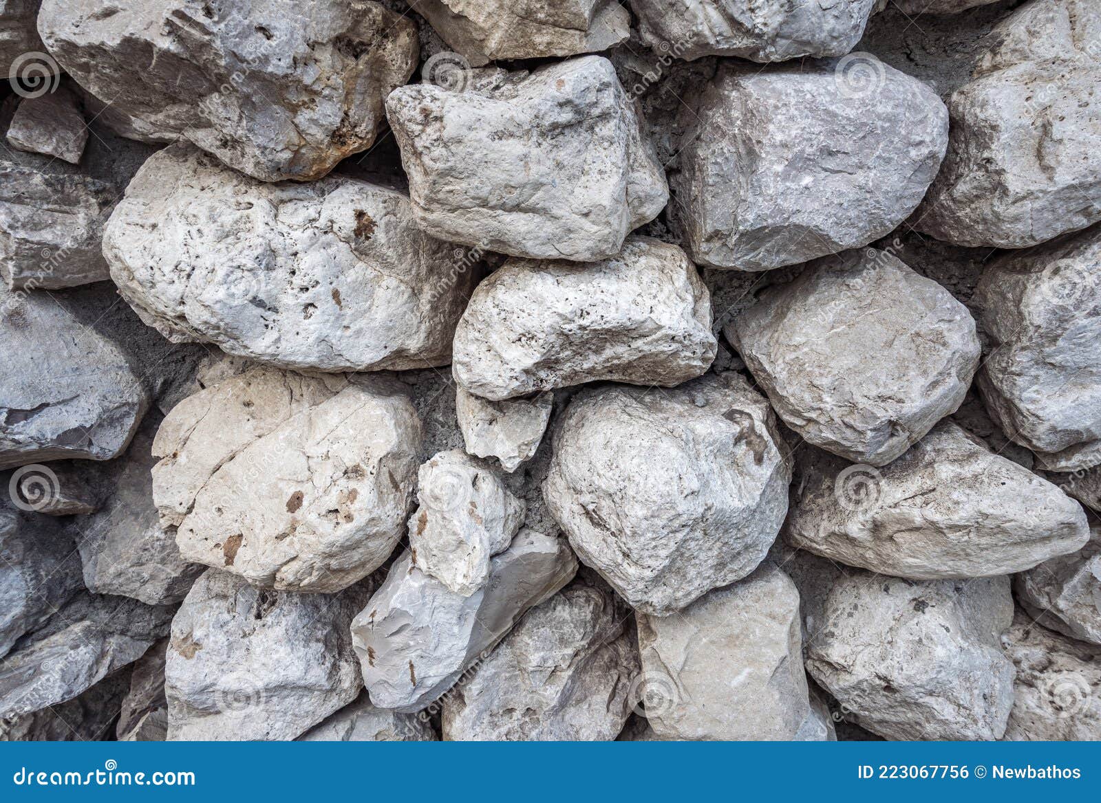 A Close-up of a Wall Texture Laid of Stone Boulders. Background Pattern ...