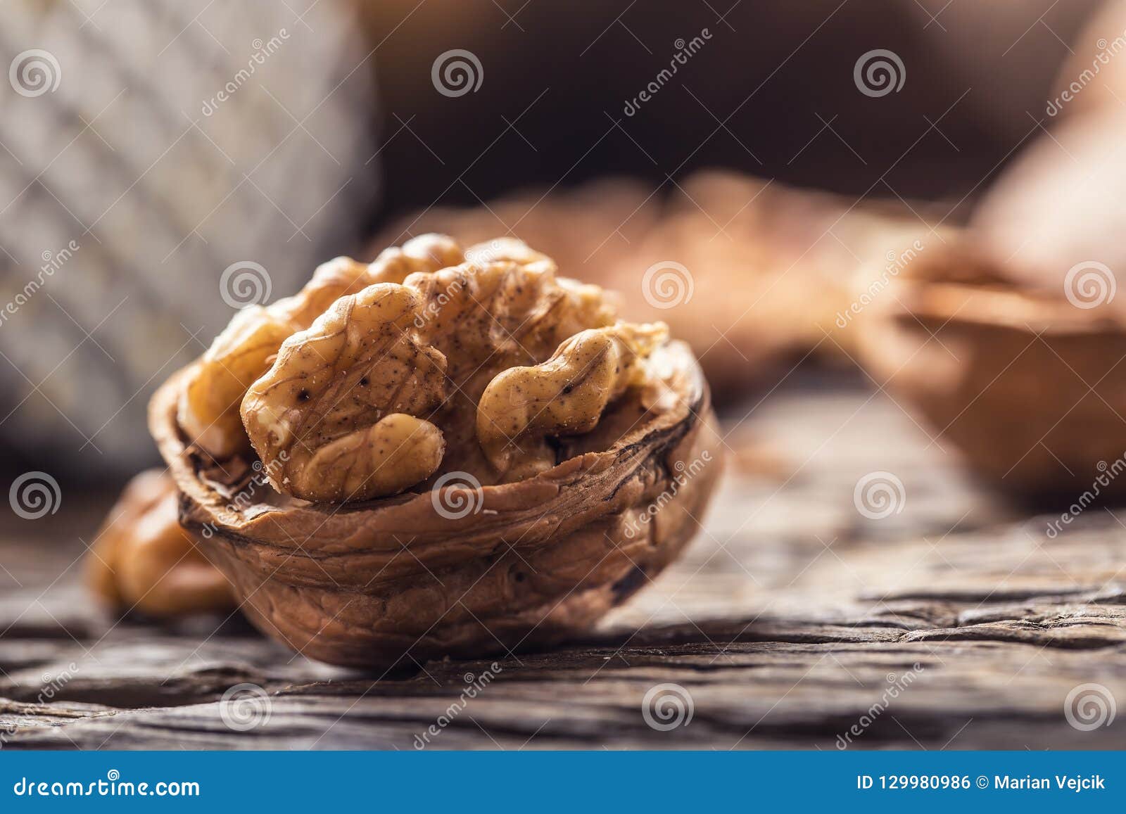 Close-up Walnut Kernel and Whole Walnuts on Old Wooden Table Stock ...