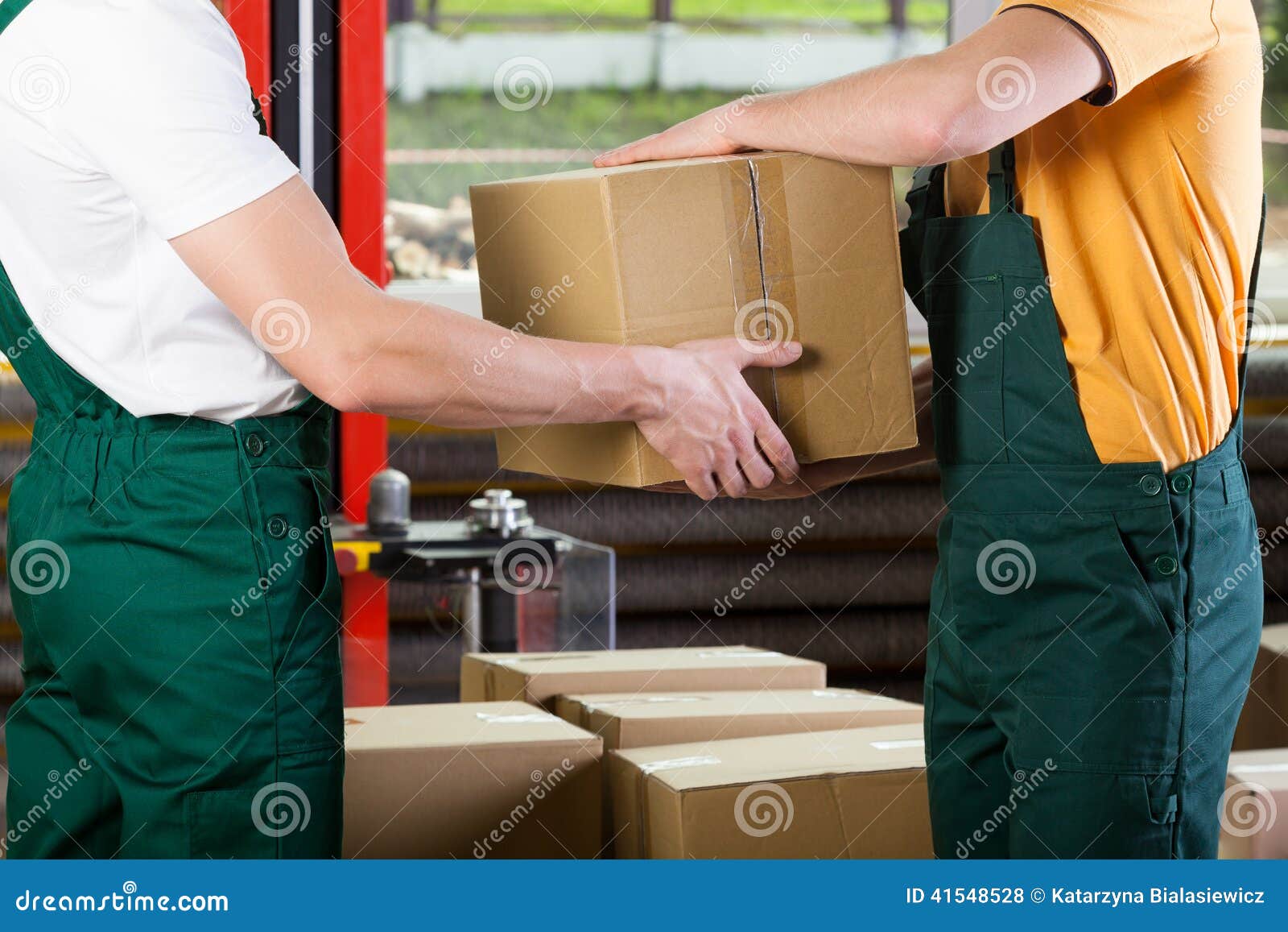 Close-up of Warehouse Workers with Box Stock Photo - Image of ...