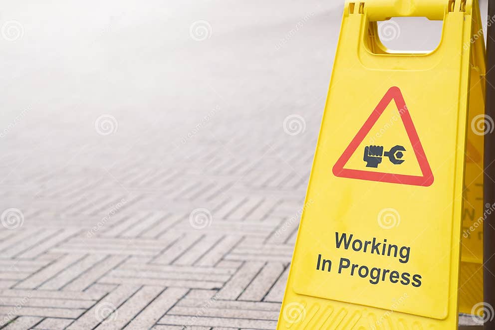 Warning Sign for Working in Process, Caution and Dangerous Stock Image ...