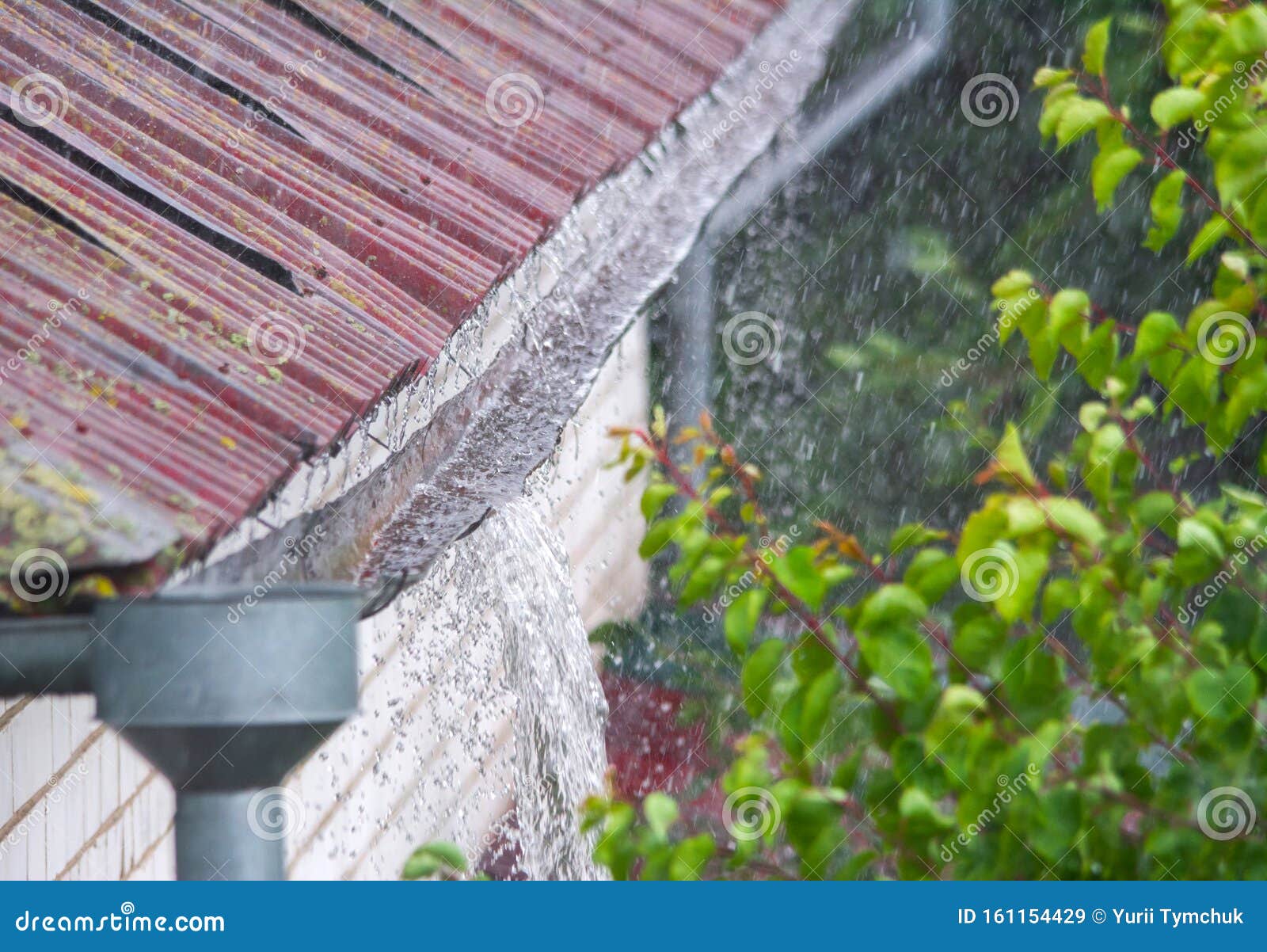 Close Up of Water Overflowing from Old Gutter during a Heavy Rainfall ...