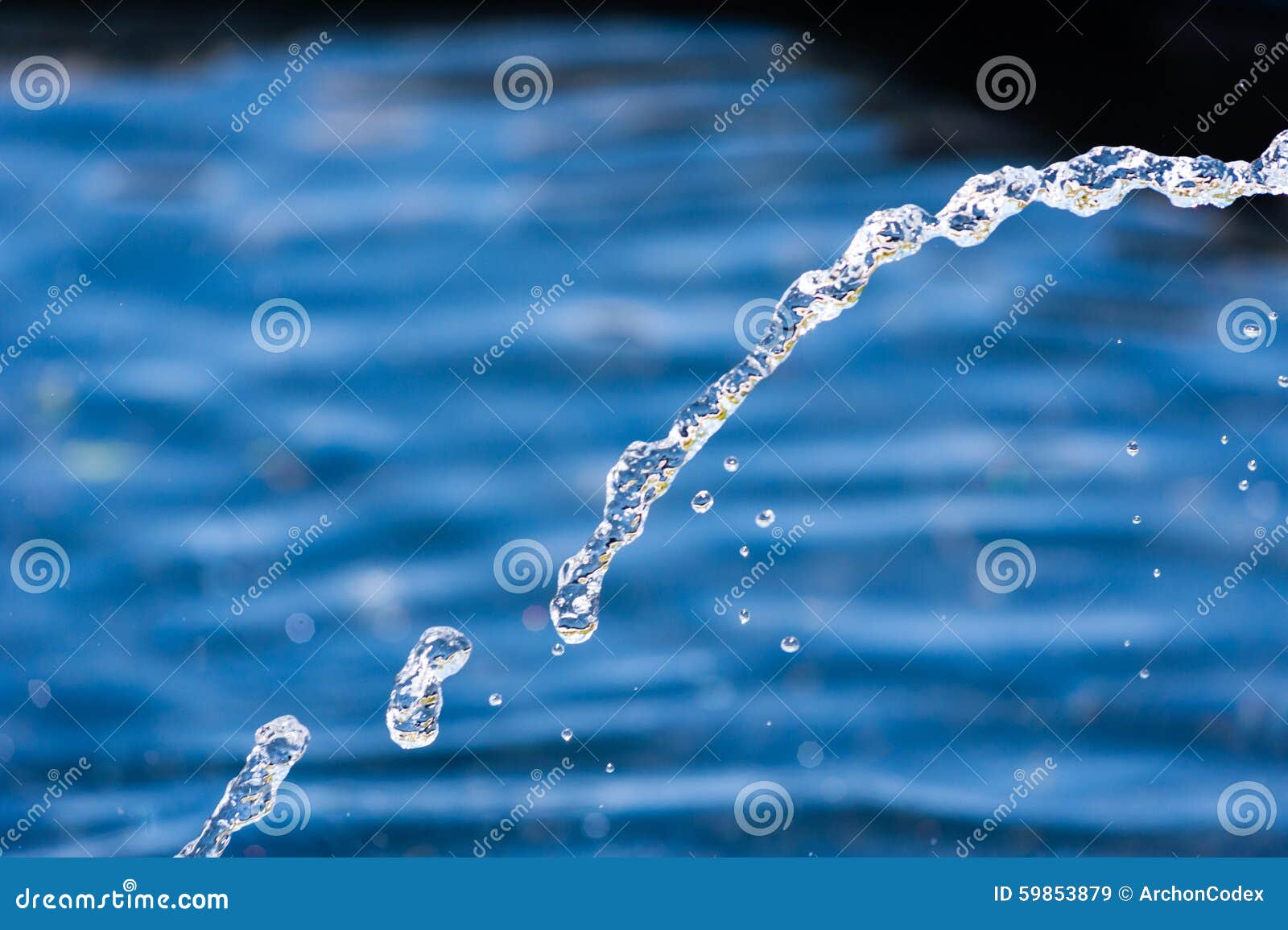 Close-up of Water Stream and Droplets Falling in Arc Stock Image ...