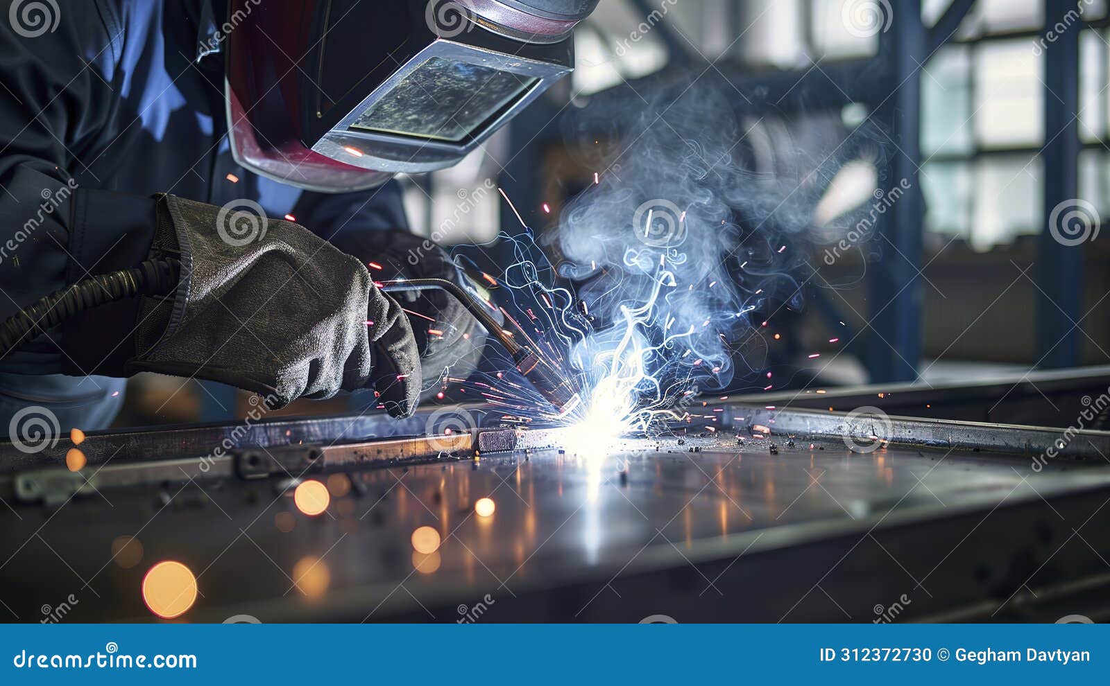 Welder is Welding in the Workstation, Welder at the Workstation, Welder ...