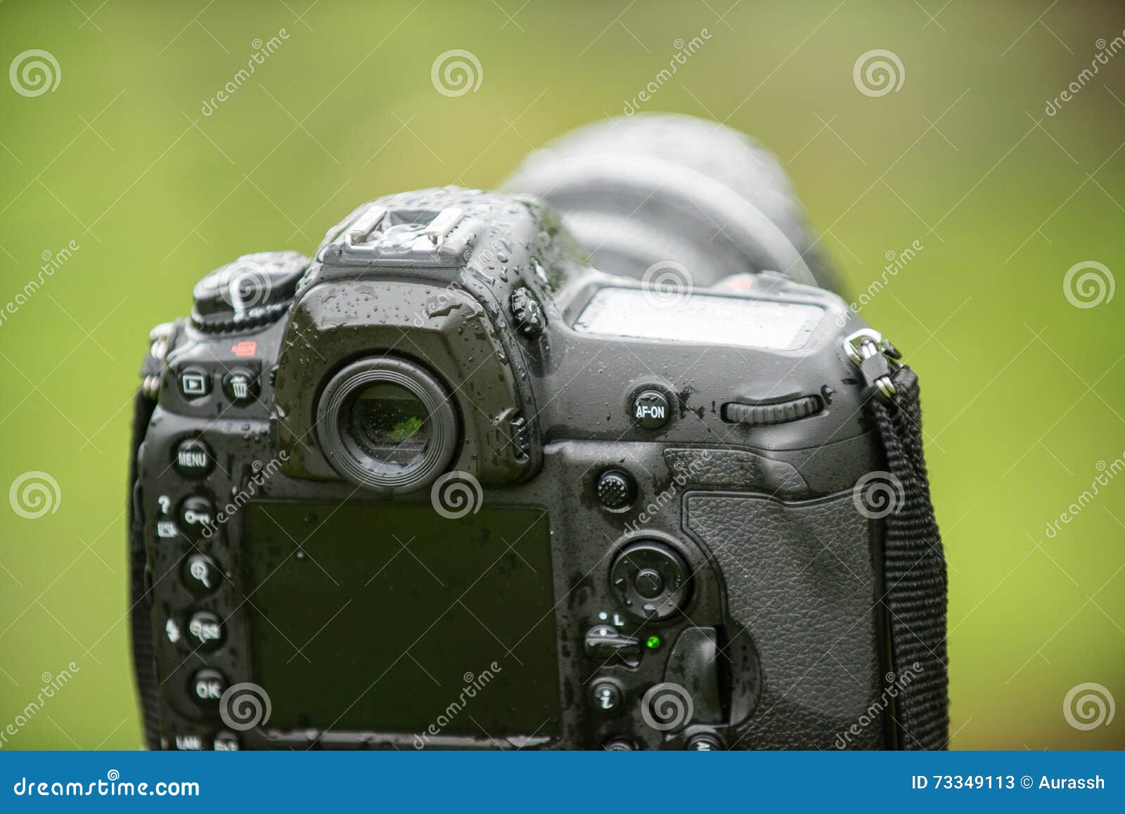 Close up of wet pro camera editorial stock photo. Image of drops - 73349113