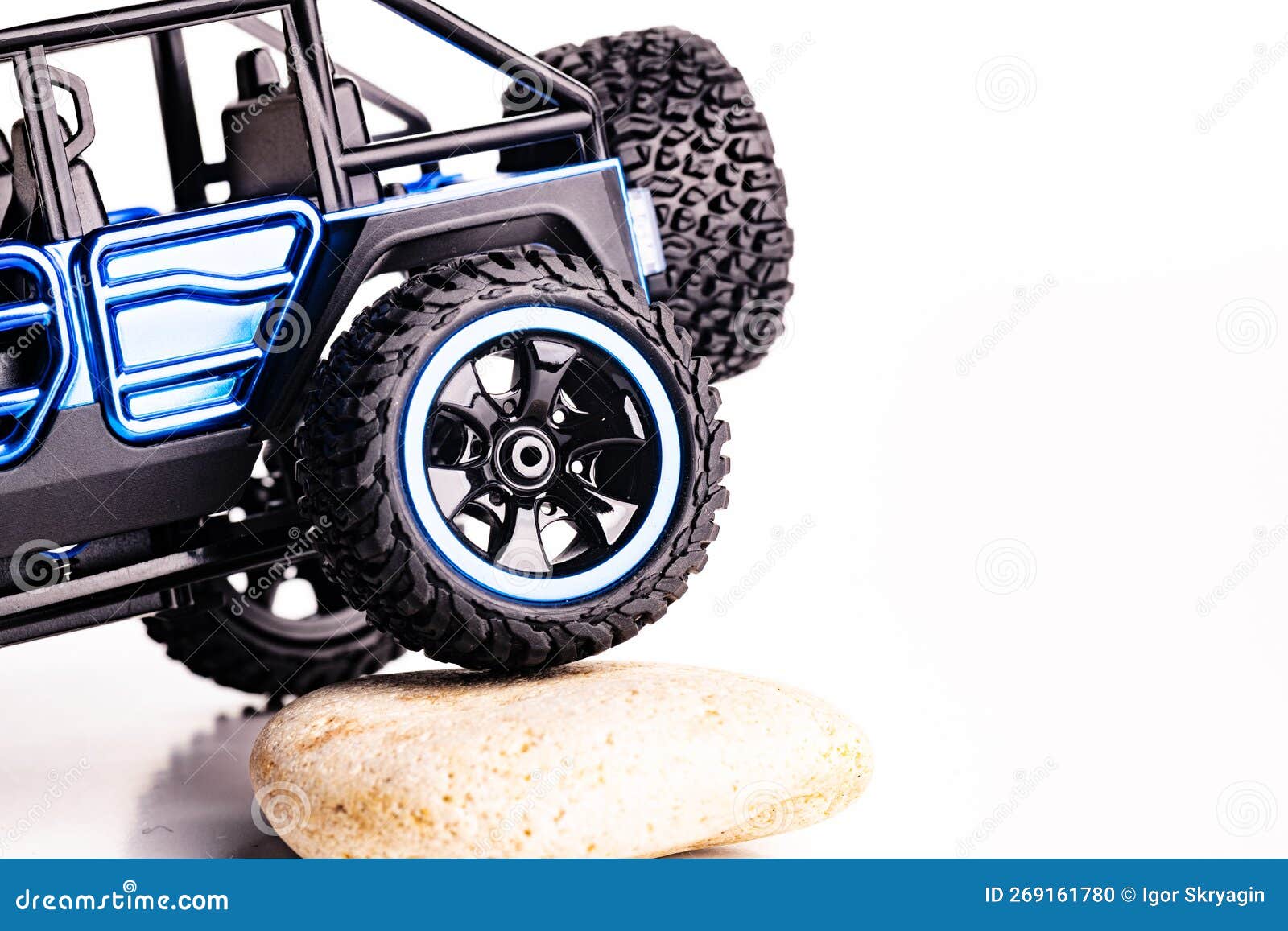 Close-up of a Wheel with an Off-road Tread on a White Background. Space ...