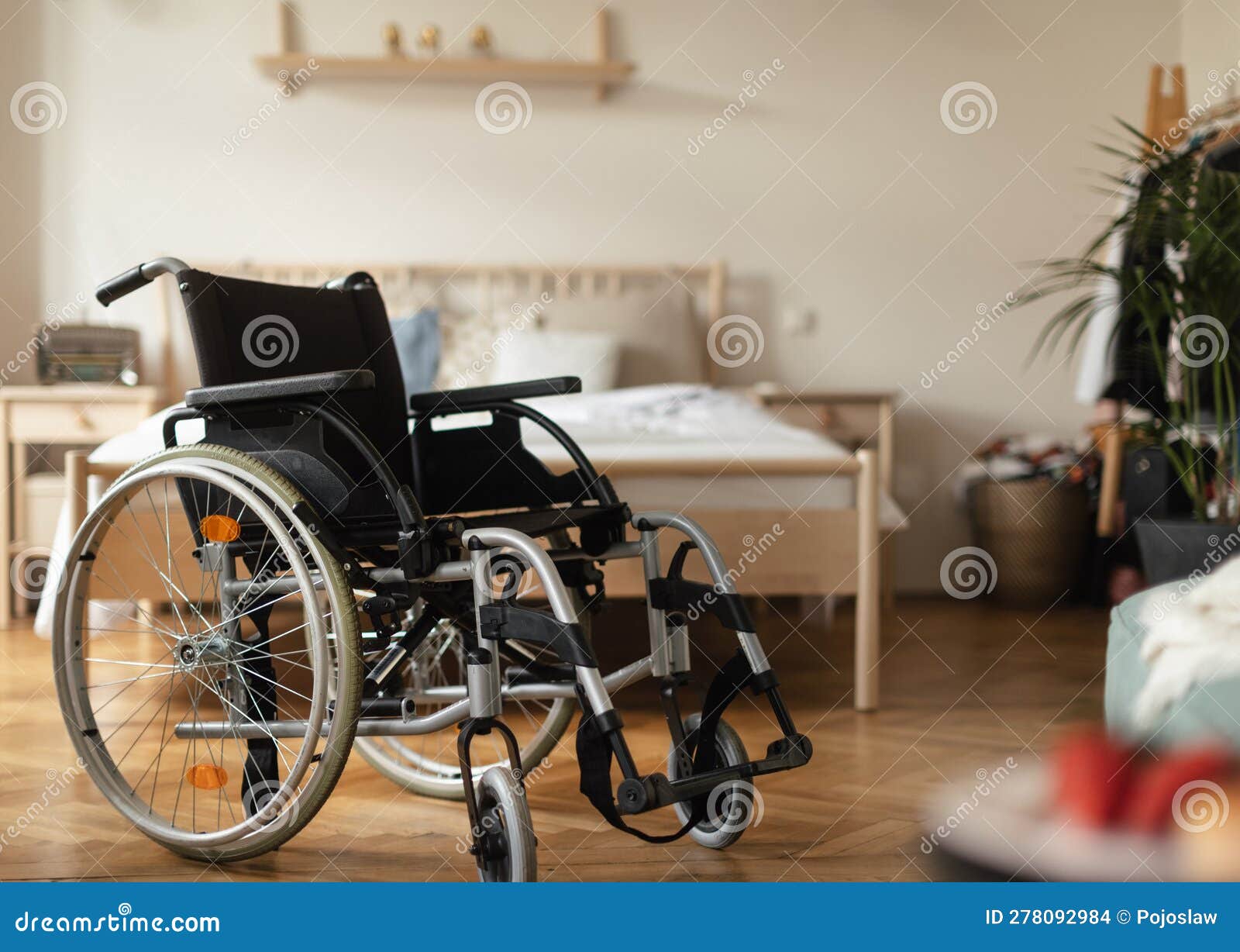 Close Up of Wheelchair in a Bedroom. Stock Photo - Image of support ...