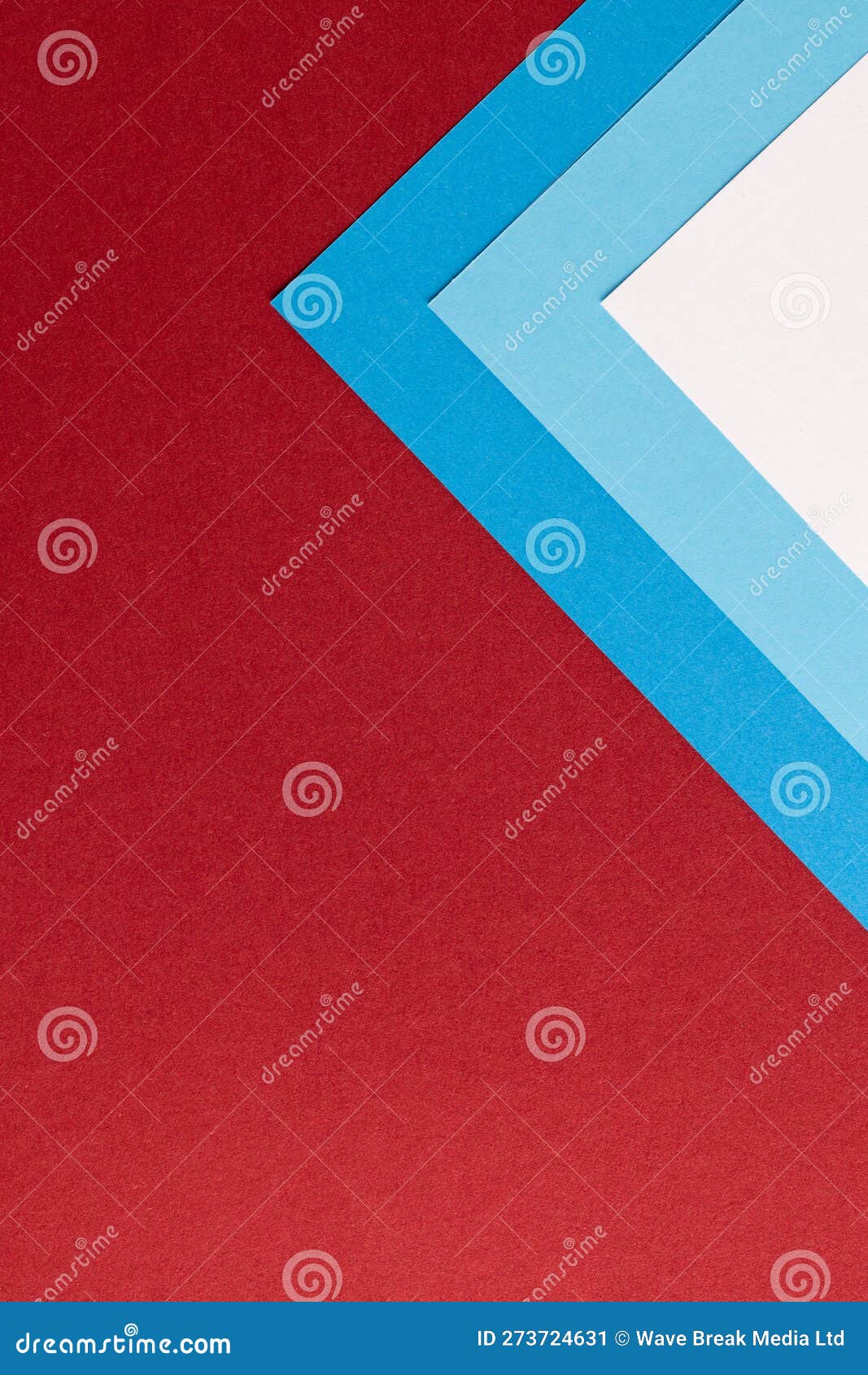 Close Up of White and Blue Paper on Red Background with Copy Space ...
