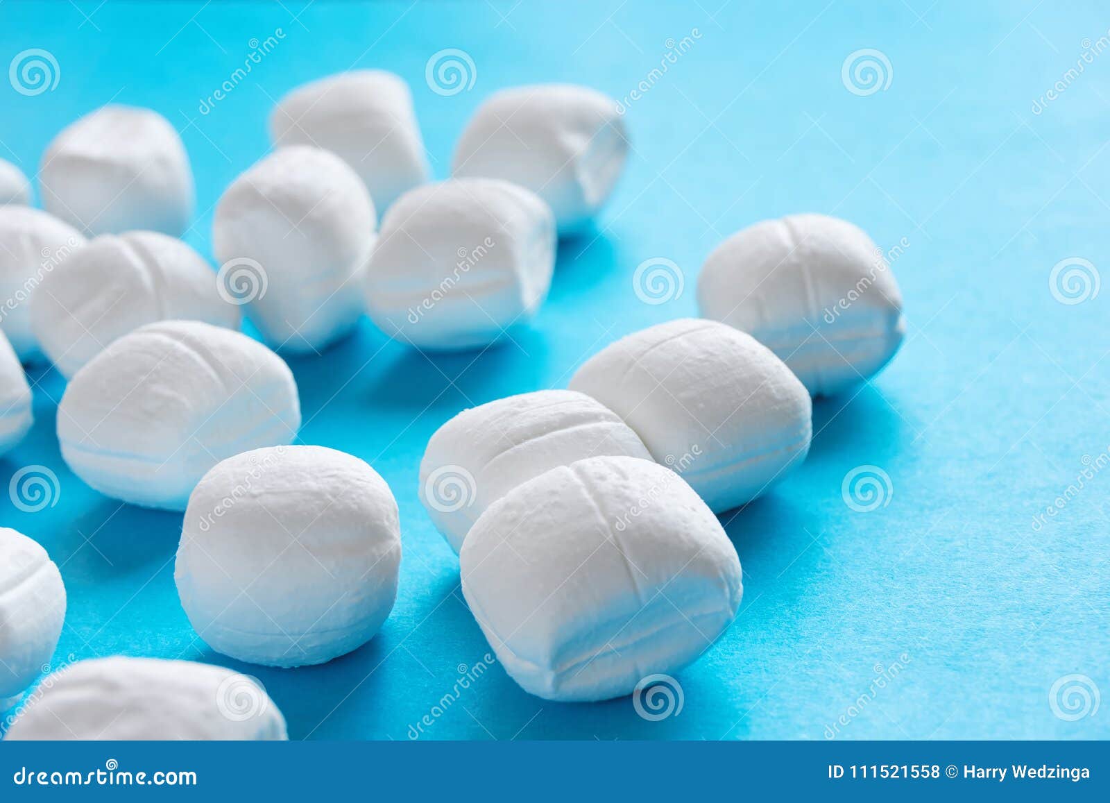 White Mint Sweets on Blue Background Stock Photo - Image of sugar ...