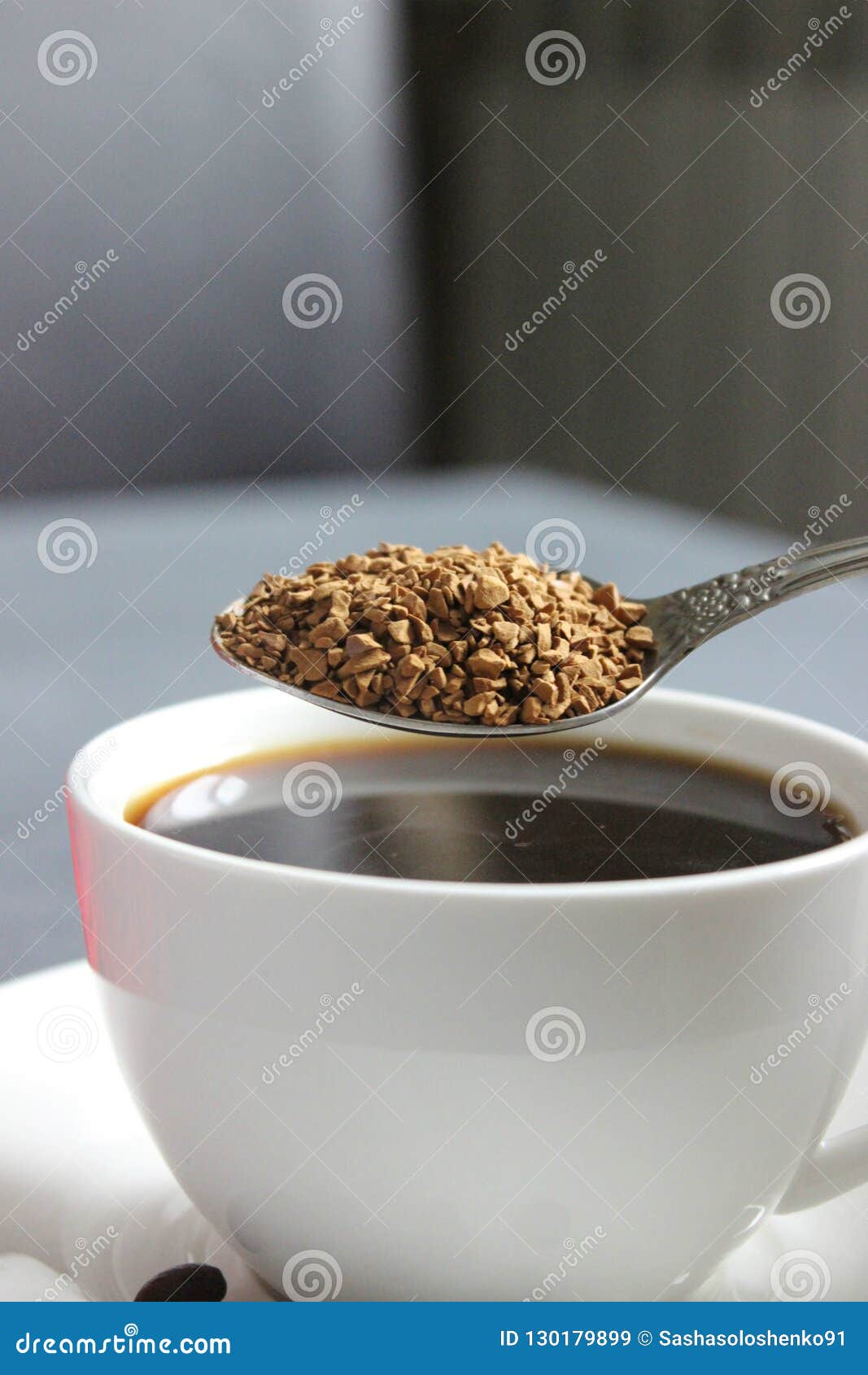 Close-up of a Cup of Coffee, Ground Coffee in a Spoon. Stock Image ...