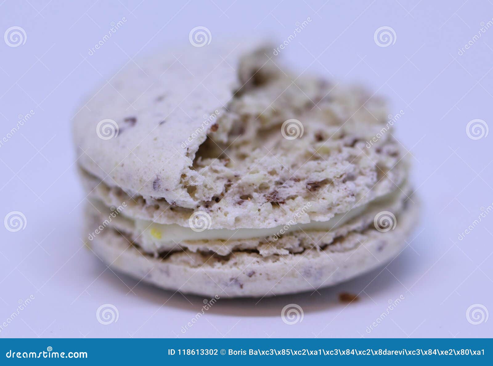 The Close Up of White Macaron with Half of Its Crusty Shell. Stock ...