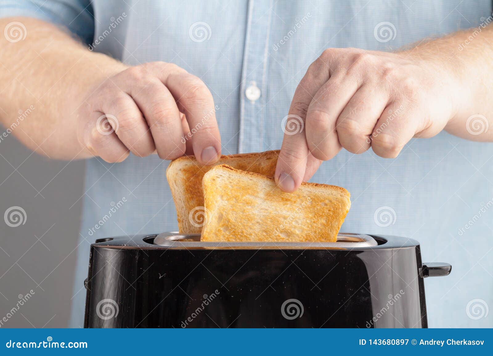 Close Up of an White Man Making Toasts at the Kitchen Stock Image ...