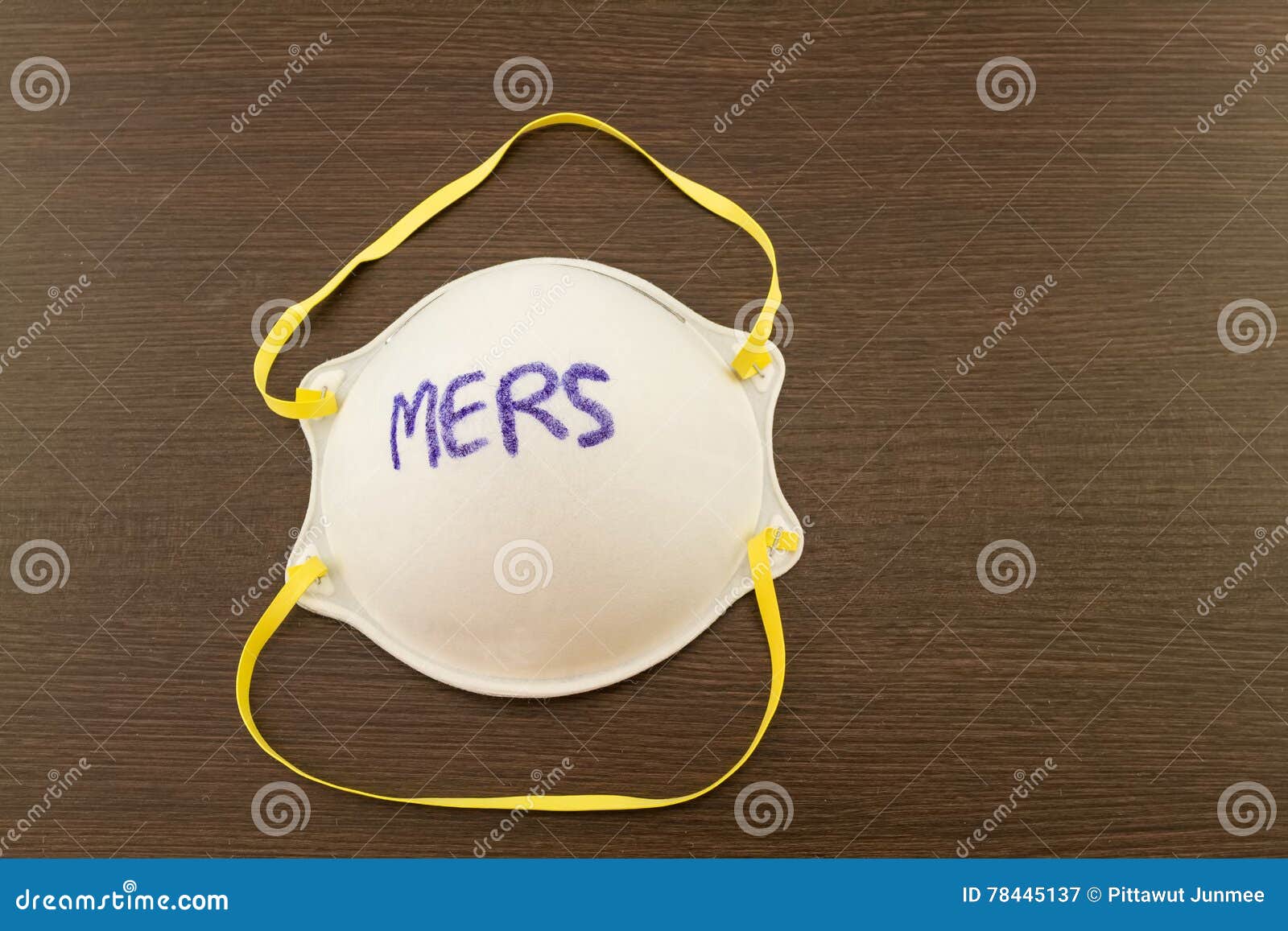 Close Up of White Mask Stack and Word MERS in Mask on Black Wooden ...