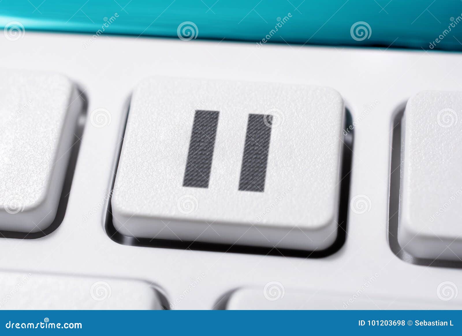 Close Up of a White Pause Button of a White Remote Control for a Hifi ...