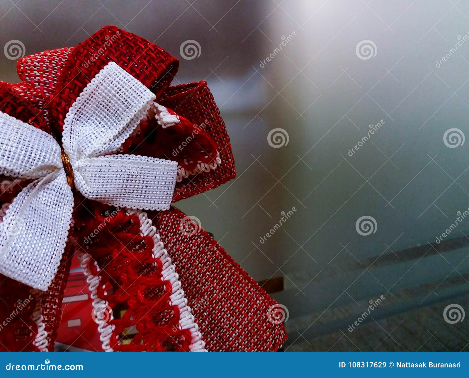 Close Up White and Red Ribbon with Blurred Background and Right Copy ...