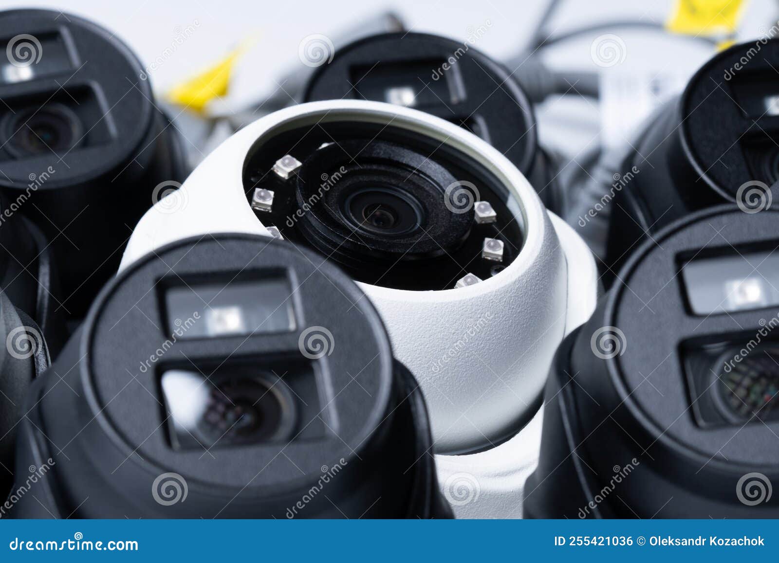 Close-up of a White Security Camera Surrounded by Black Cameras Stock ...