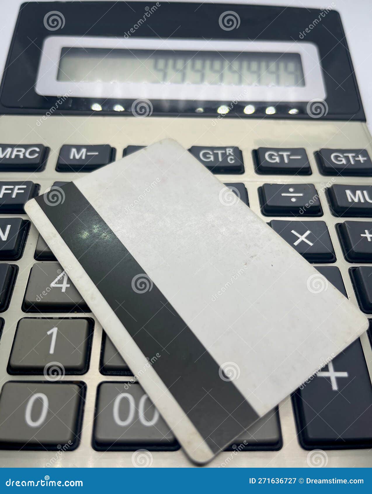 Closeup of White Stripped Credit Card on a Calculator Stock Image ...