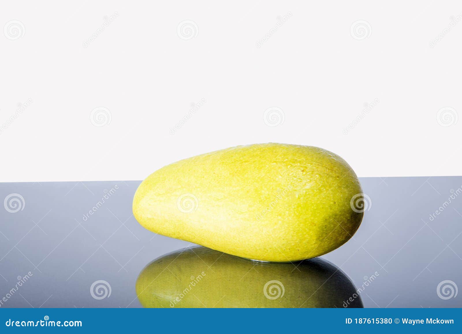 Mango on glass stock photo. Image of citrus, colorful - 187615380