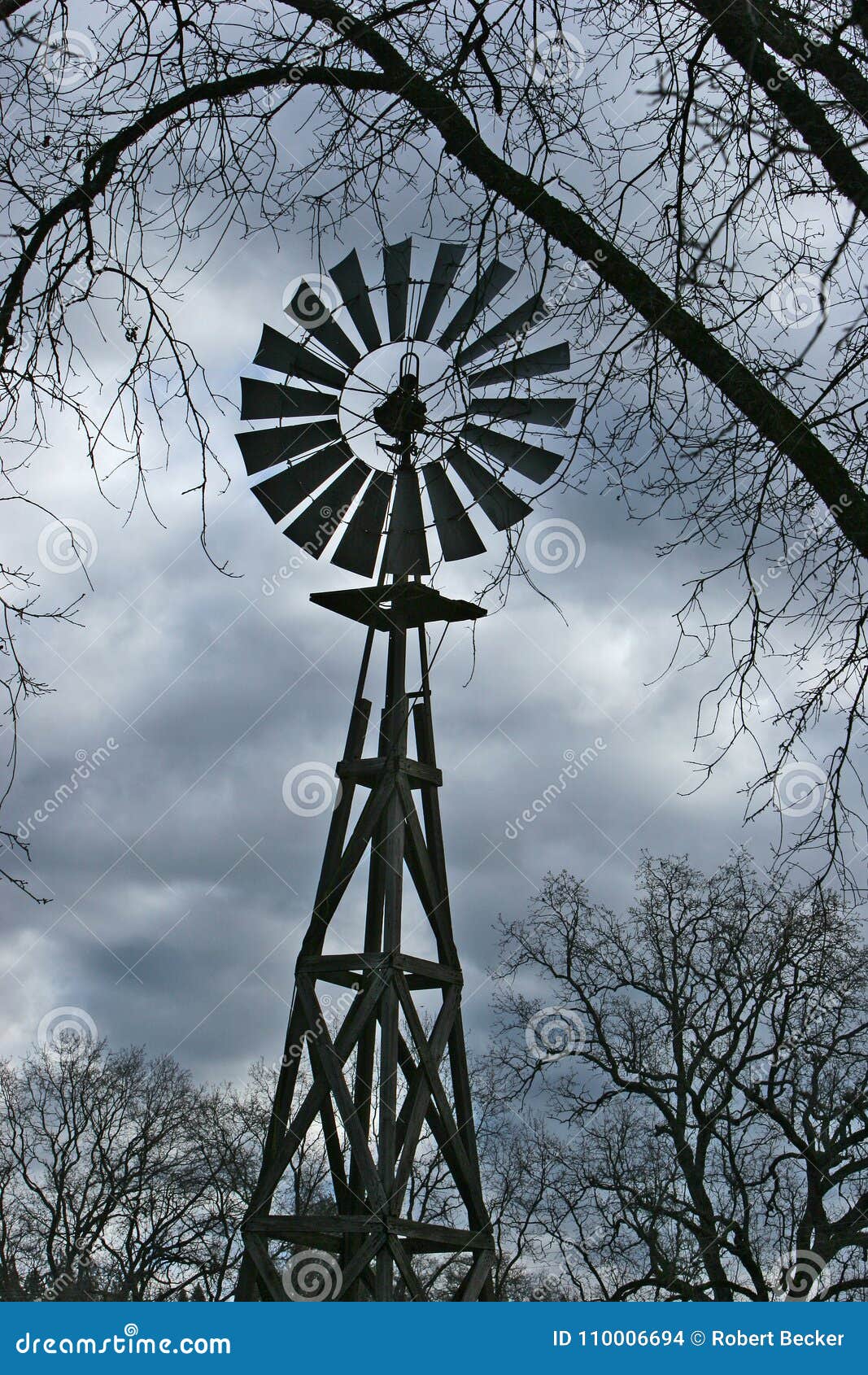 Wind mill in the trees stock photo. Image of work, selfrelient - 110006694