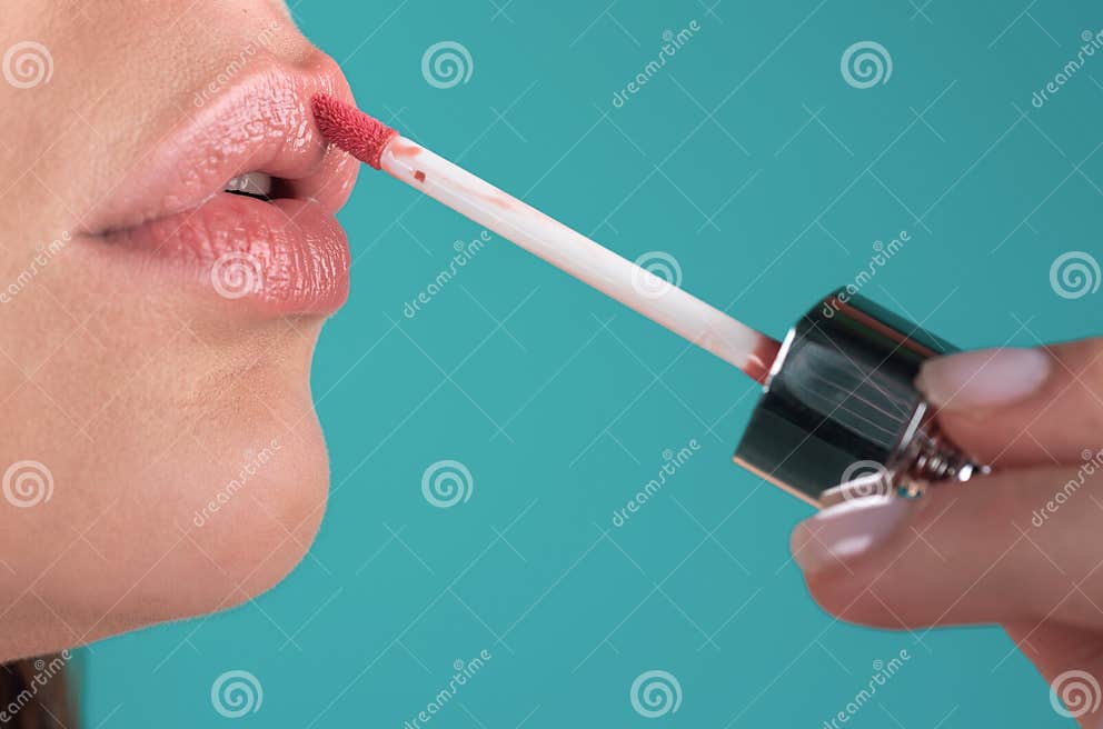 Close Up Woman Applying Red Lipstick On Lips Girl Applied Lipstick