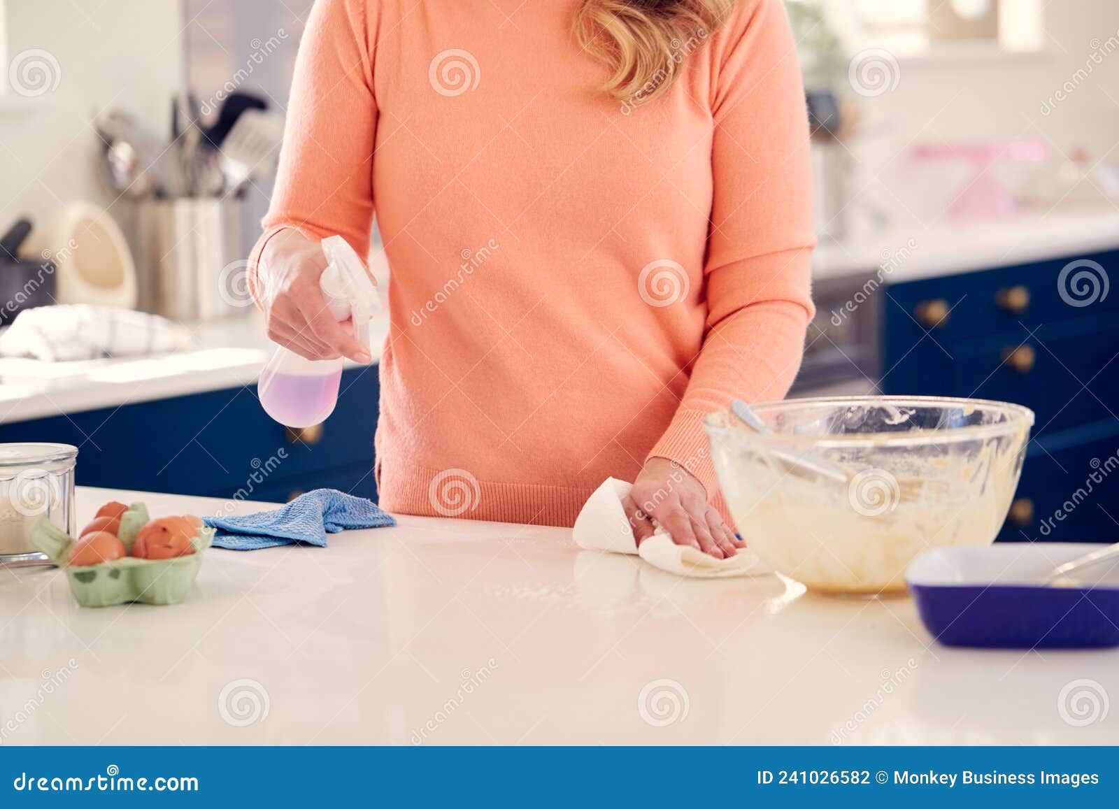 Close Up of Woman Cleaning Kitchen Counter after Cake Baking Stock ...