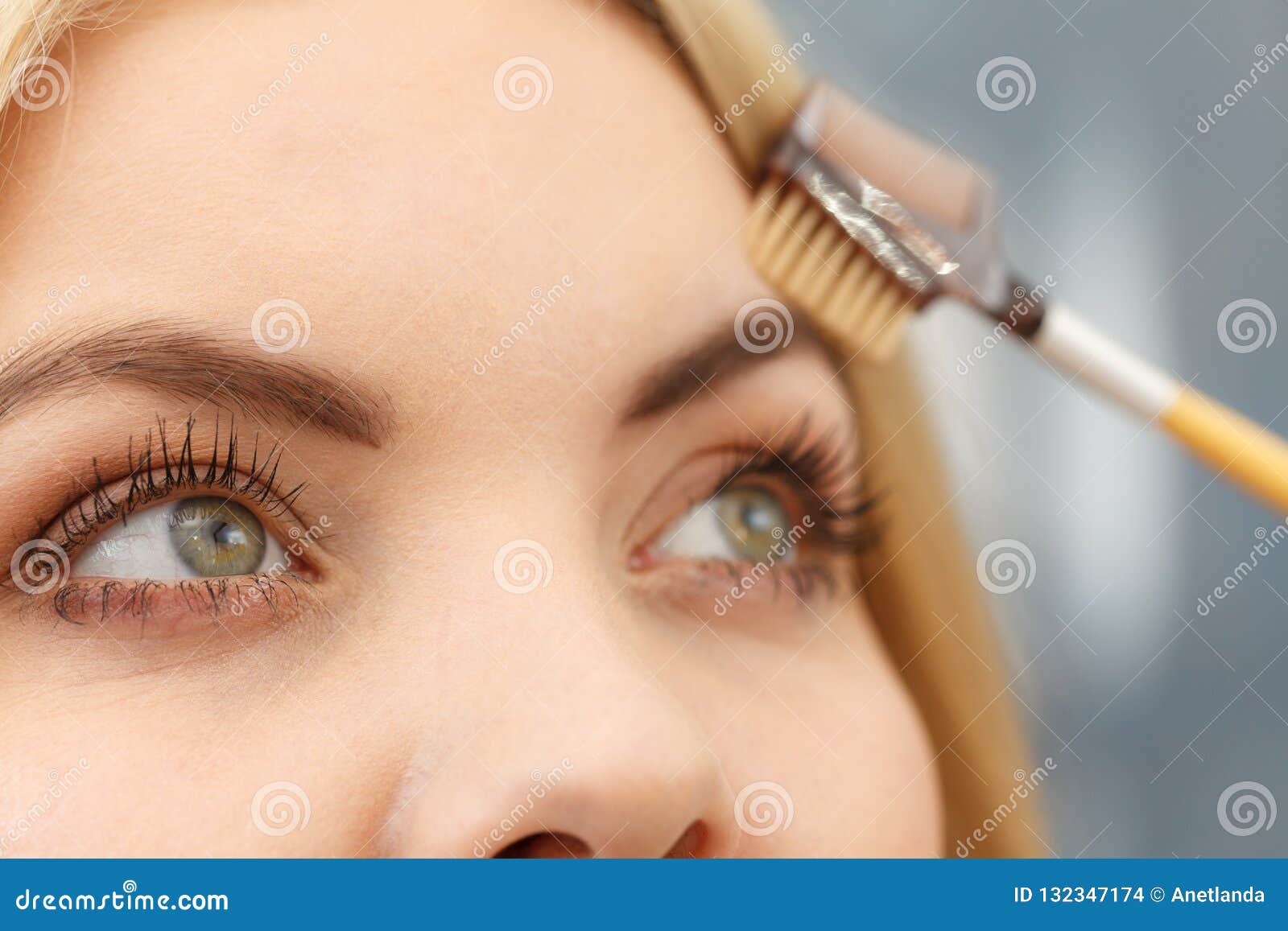 Woman Brushing Her Eyebrows Stock Photo - Image of eyebrows, woman ...