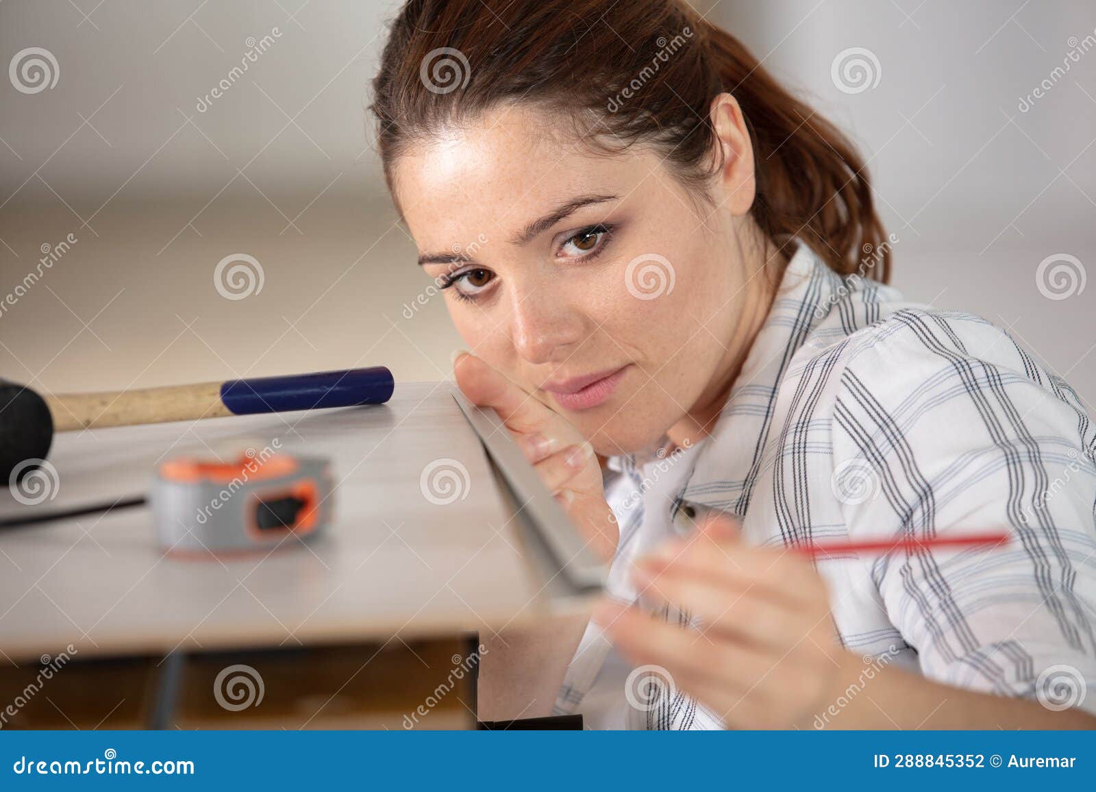 Close Up on Woman Hand Using Measuring Tape on Table Stock Photo ...