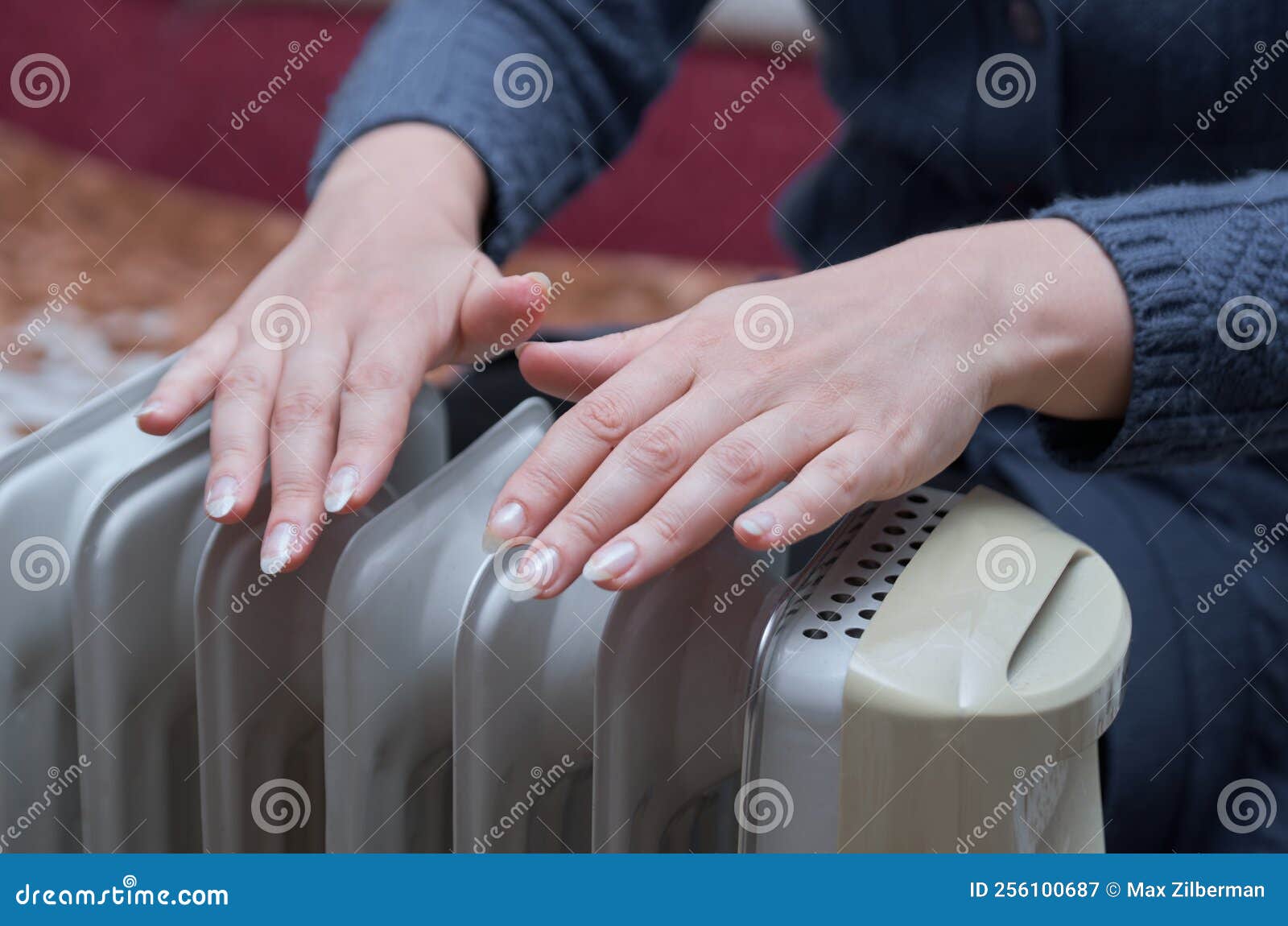 Close Up of Woman Hands Warming by an Electric Heater Stock Image ...