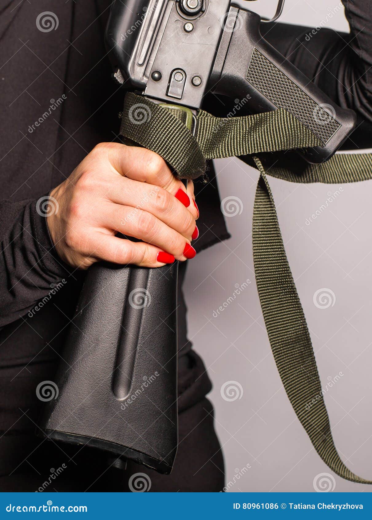 Close Up of Woman Holding an Automatic Assault Rifle Stock Photo ...