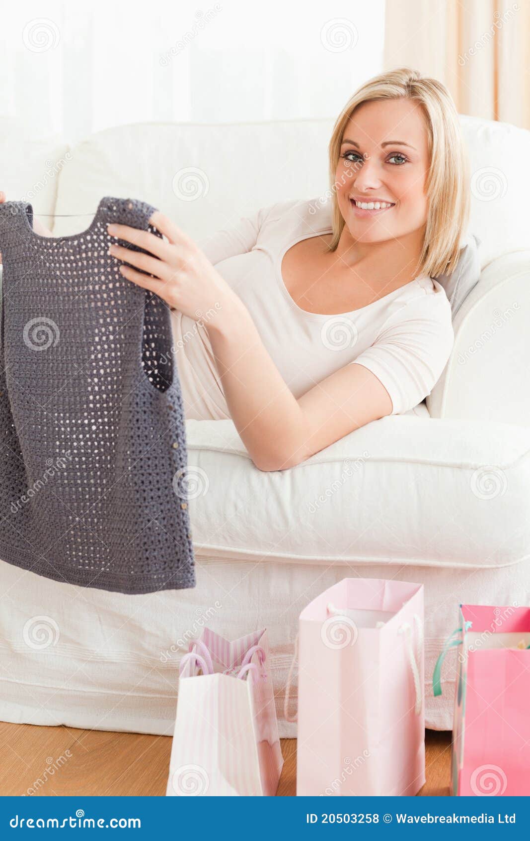 Close Up of a Woman Holding the Clothes she Bought Stock Photo - Image ...