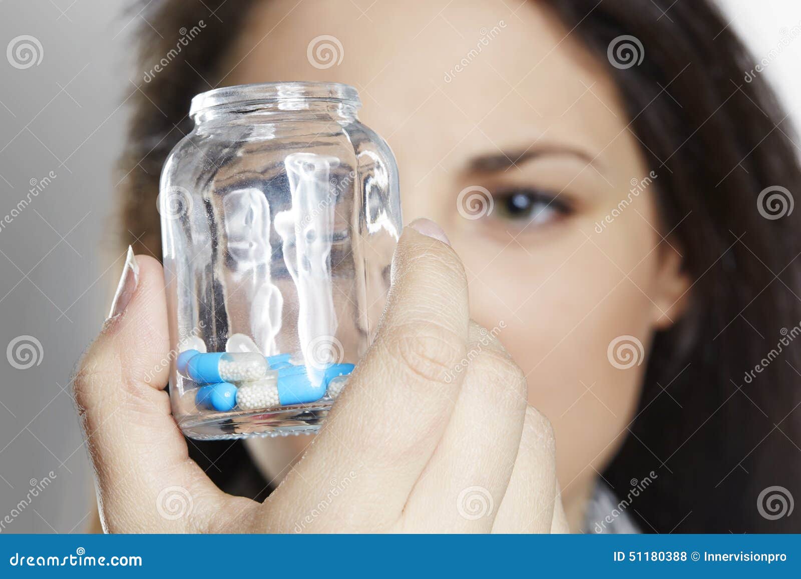 Close Up Of Woman Holding Pill Container Royalty Free Stock Image