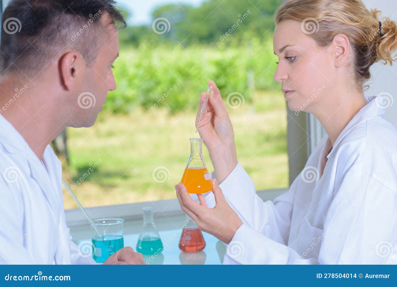 Close Up Woman and Man Testing Stock Photo - Image of experiment ...