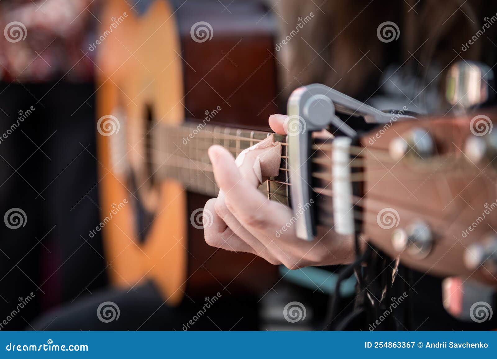 Close-up of Woman Playing Guitar. Hand of Woman Playing Guitar on the ... Close-up of Woman Playing Guitar. Hand of Woman Playing Guitar on the ...
