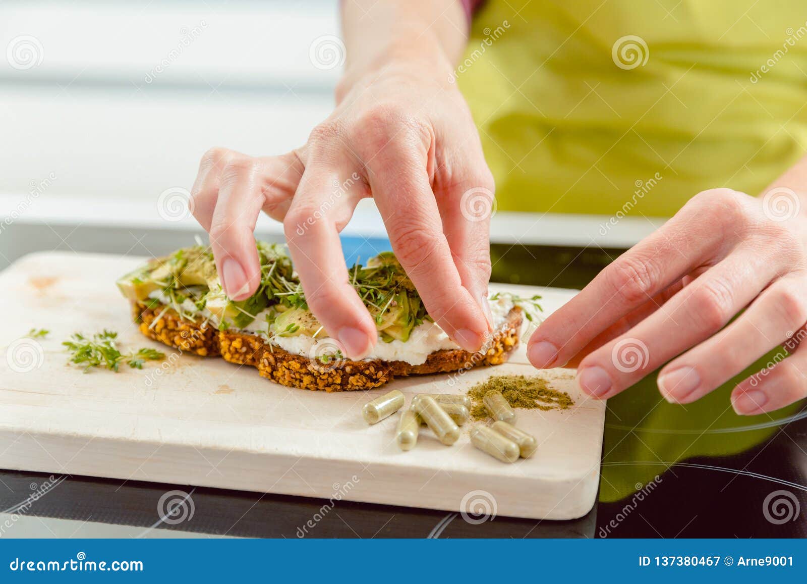 Woman preparing sandwich stock image. Image of health - 137380467