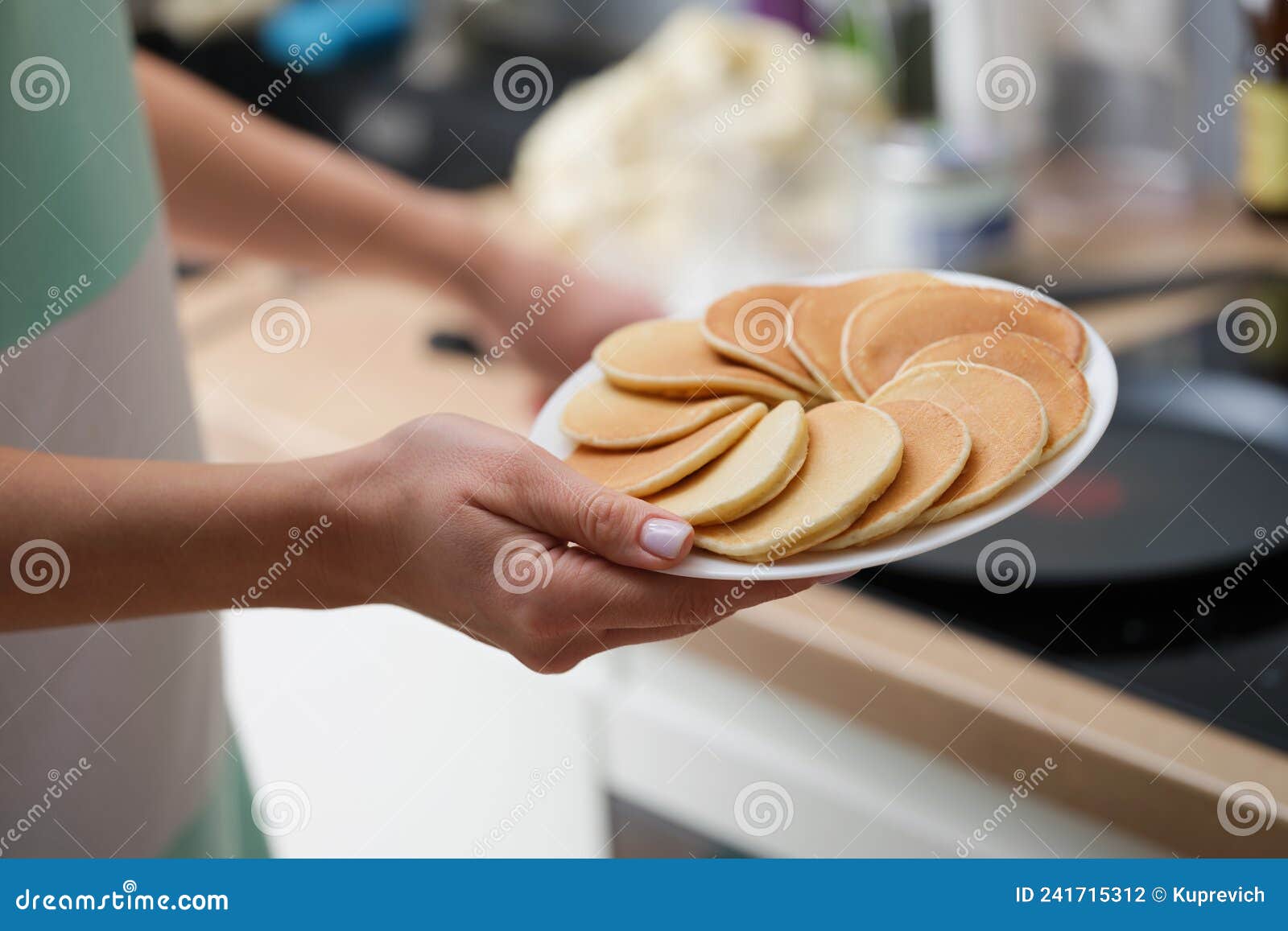 A Woman& X27;s Hand Holds a Plate of Pancakes Stock Photo - Image of ... A Woman& X27;s Hand Holds a Plate of Pancakes Stock Photo - Image of ...