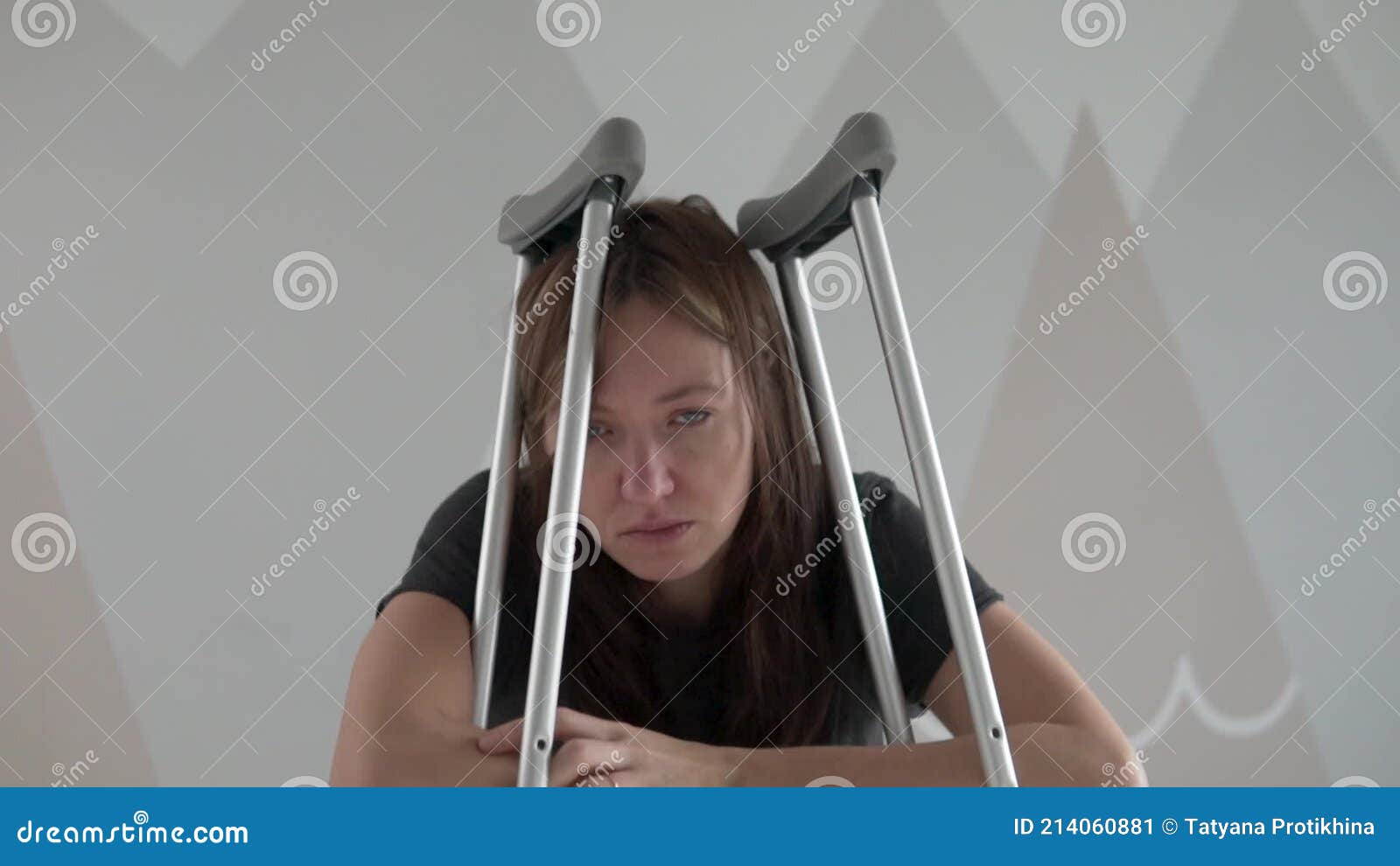 Close-up, the Woman is Sad Leaning on Crutches Stock Video - Video of ...